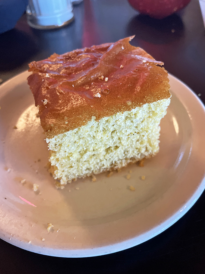 Behold, the holy grail of carbs! This cornbread slice is so perfect, it could make a gluten-free diner weep with envy.