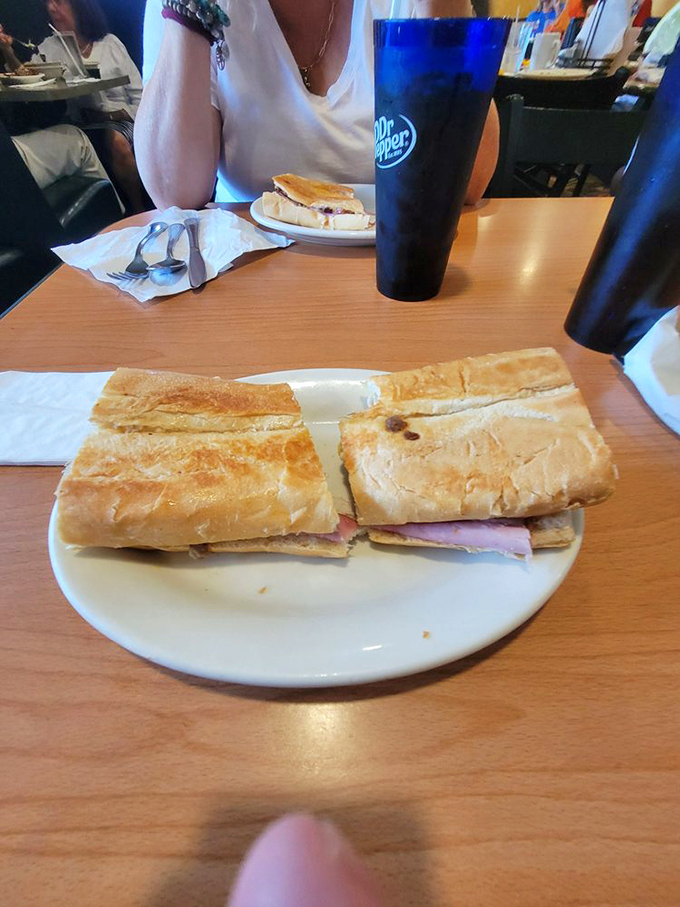 The Cuban sandwich: Tampa's edible masterpiece. It's like a warm, crispy hug for your taste buds. Resistance is futile!