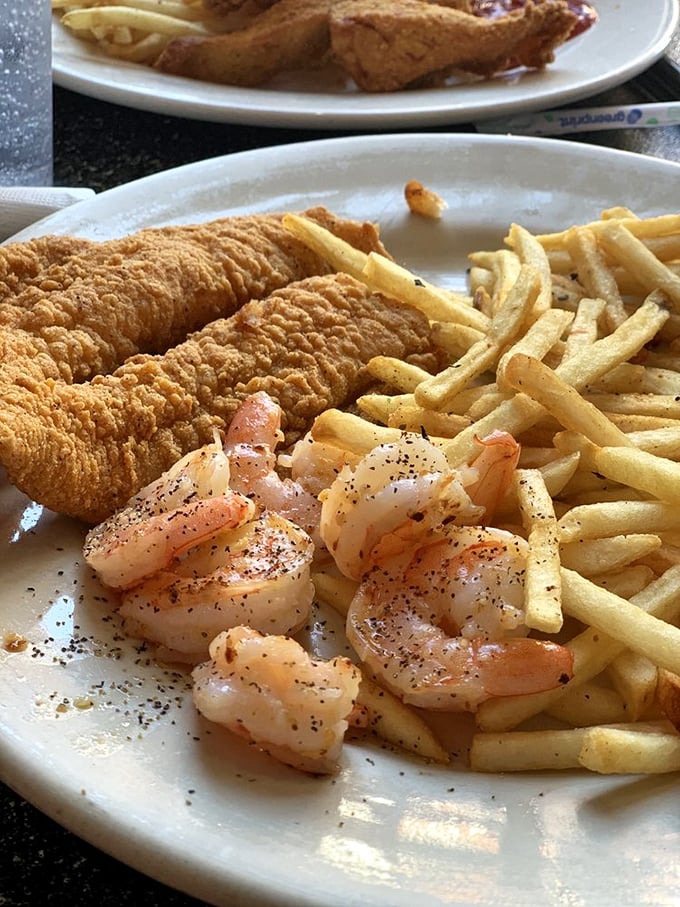 Fried catfish and grits: a Southern duet so perfect, it could headline at the Grand Ole Opry. Comfort food that hits all the right notes.