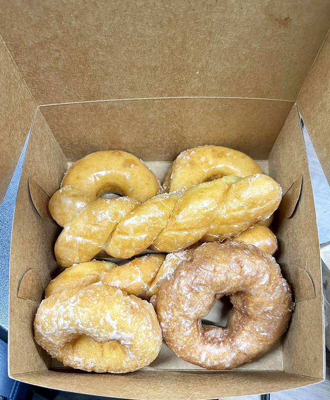 The Twisted Sister of donuts! This glazed masterpiece is coiled tighter than my nerves before coffee, but infinitely more delightful.