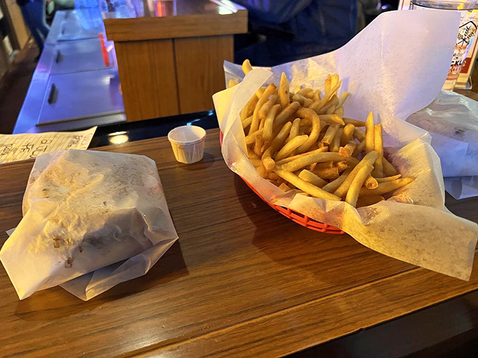 The dynamic duo of diner delights! A Jucy Lucy and fries - the Batman and Robin of comfort food.