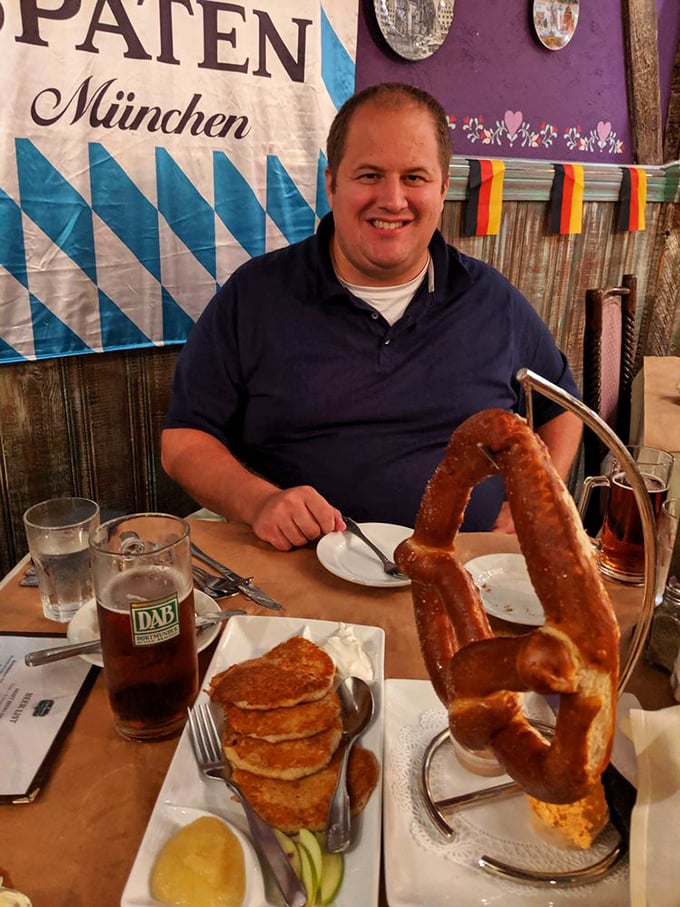 A feast fit for a Bavarian king! Crispy potato pancakes, a pretzel that could double as a life preserver, and a cold beer to wash it all down.