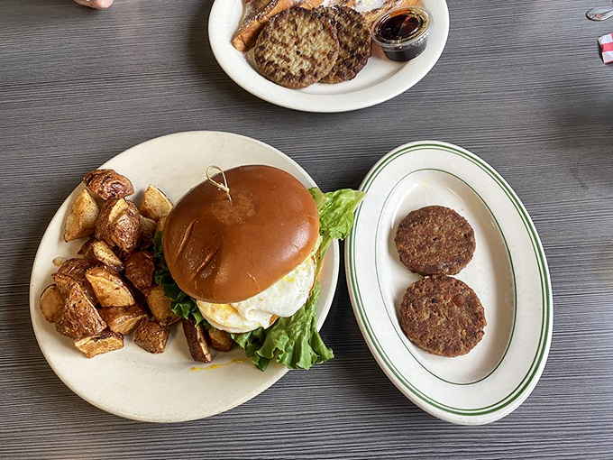 Behold, the breakfast sandwich that puts your sad desk lunch to shame. It's like a hug for your mouth, but with more cheese.