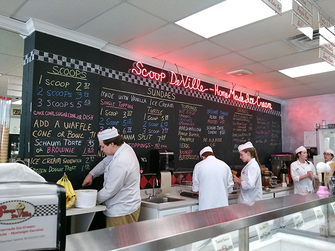 The ice cream dream team in action! These soda jerks (that's a compliment, folks) are ready to whip up your next favorite treat.