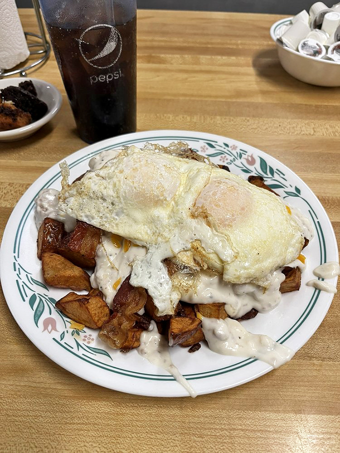 The "Pile Down" laughs in the face of hunger! This tower of breakfast bliss could fuel a small army… or one very happy diner.