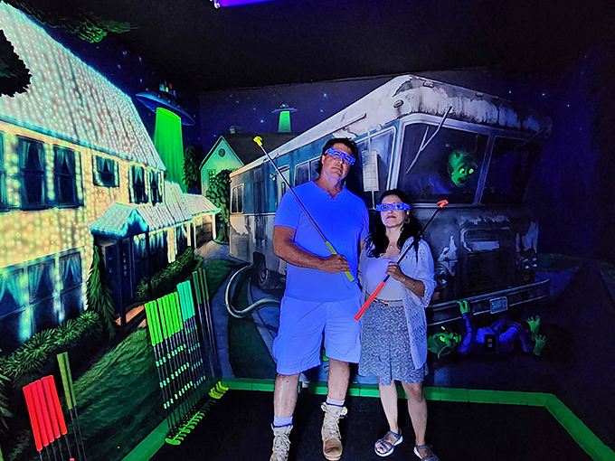 "Honey, I think we took a wrong turn at Albuquerque." These earthlings seem delightfully lost in an extraterrestrial suburban fever dream.