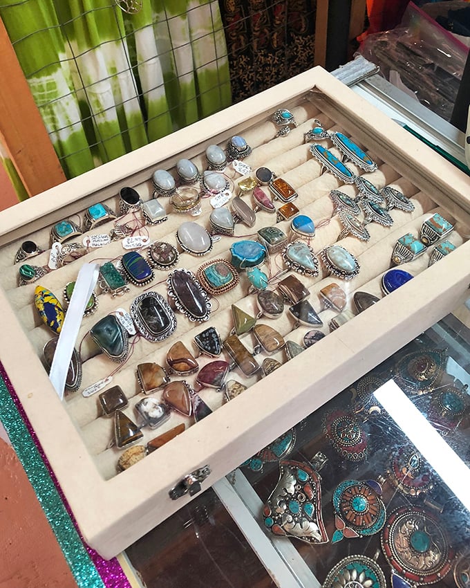Jewelry lovers, rejoice! This tray of rings is a treasure chest for those seeking to adorn their digits with vintage vibes.