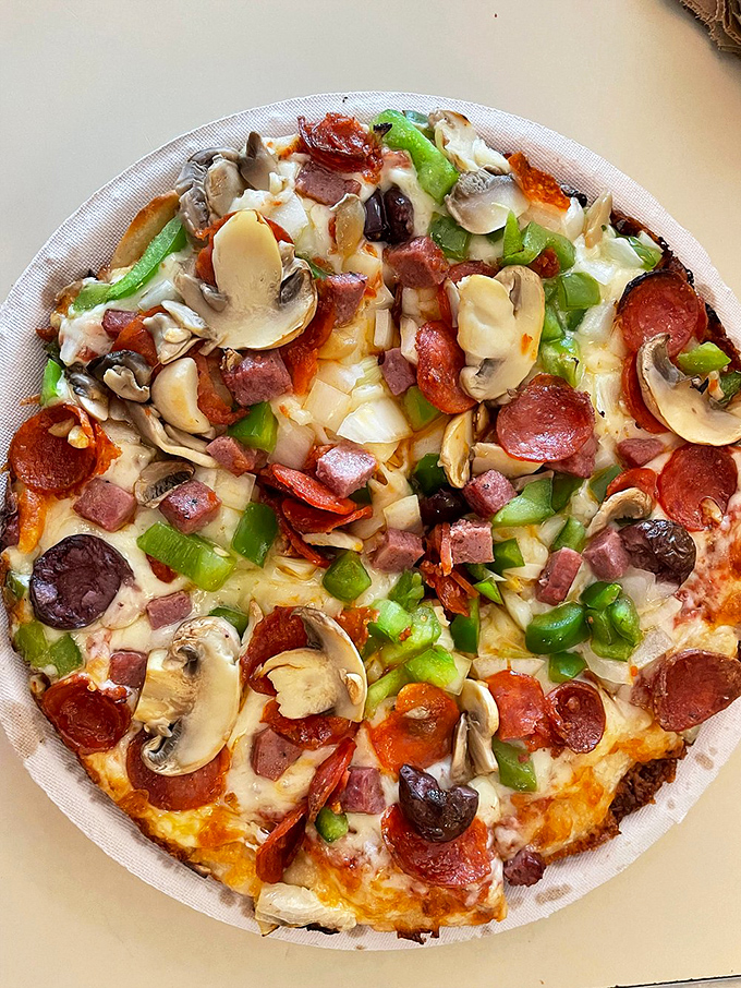 The "Alex Special" - a pizza so packed with toppings, it's like the culinary equivalent of stuffing your suitcase for a month-long vacation.