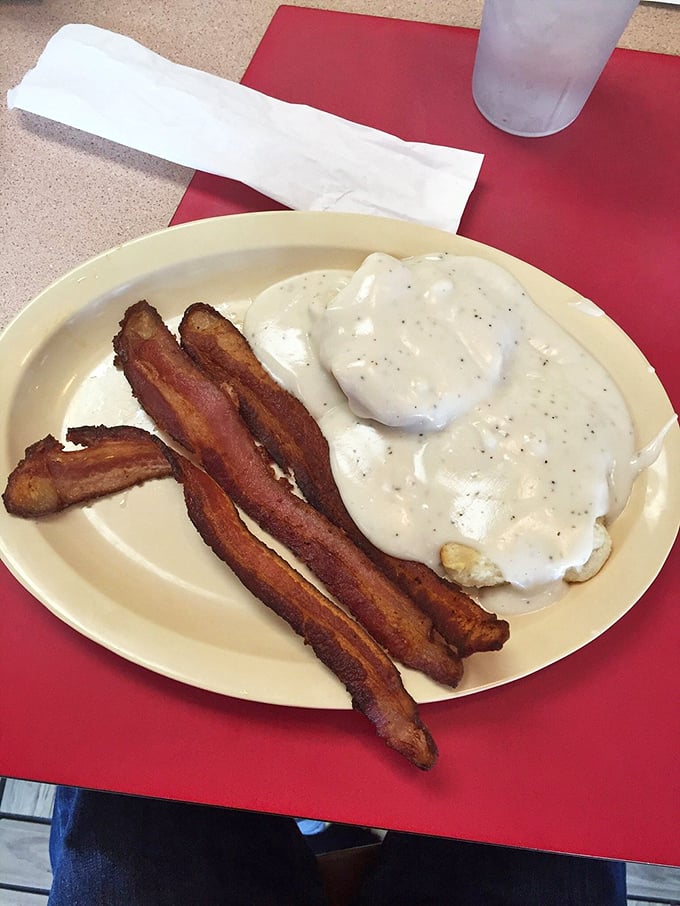 Biscuits and gravy: the breakfast of champions! Add some crispy bacon, and you've got a meal that could fuel a rocket launch.