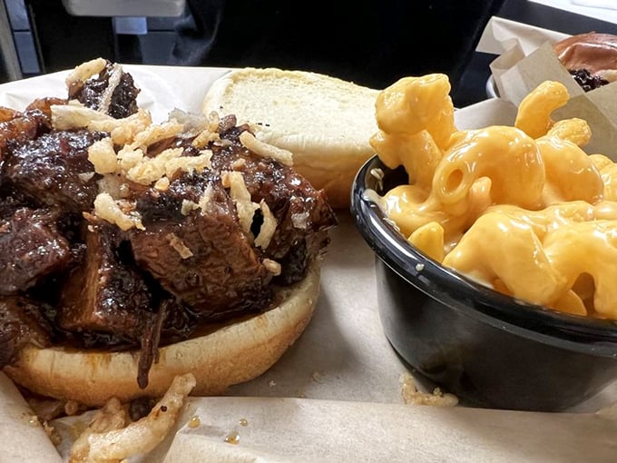 The Burnt End Sandwich: A tower of smoky perfection that'll make your taste buds do a happy dance. It's like a meaty skyscraper in bread form!