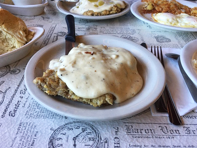 Behold, the crown jewel of comfort cuisine! This country-fried steak is crispy, creamy, and criminally delicious. Diet? What diet?