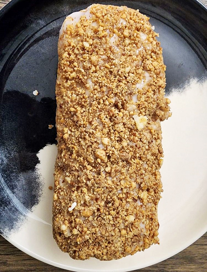 This peanut-topped pastry bar isn't just a treat, it's architecture &ndash; layers of flavor built to satisfy the most discerning sweet tooth.