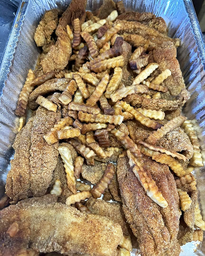 A sea of flavors awaits! This tray is like a treasure chest, but instead of gold, it's filled with crispy fish goodness.