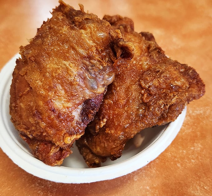 Finger-lickin' good doesn't even begin to cover it. Ray's fried chicken: a crispy love letter to your taste buds.