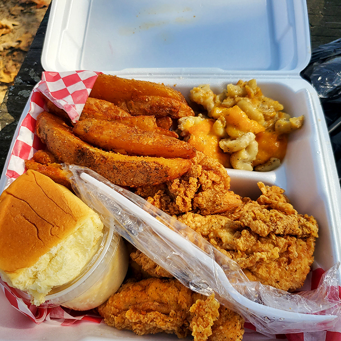 Who needs a silver platter when you've got this? Fried chicken, crinkle-cut fries, and sides that'll make your taste buds do a happy dance.