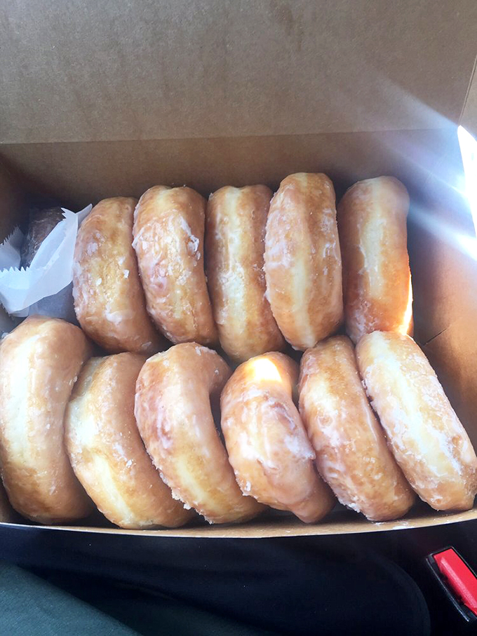 Golden rings of joy, stacked like delicious Olympic medals. These glazed beauties are ready to take the gold in your personal donut Olympics.