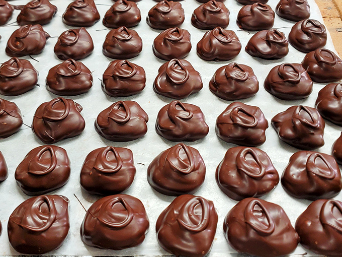 Chocolate waves frozen in time! These handmade toffees look like they're doing the twist, and they'll make your taste buds dance.