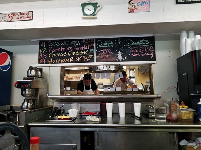 Where the magic happens! These kitchen wizards are whipping up plates of joy faster than you can say "over easy."