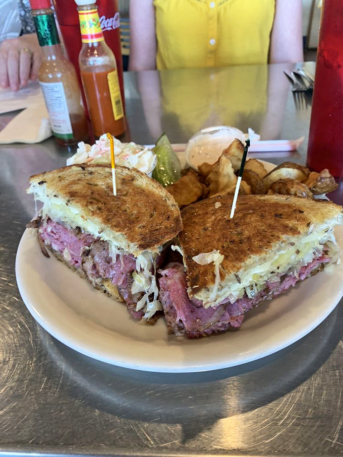 The "Perfect Reuben" lives up to its name! It's a towering testament to the art of sandwich-making. Forget the fork &ndash; you'll need a crane for this one!