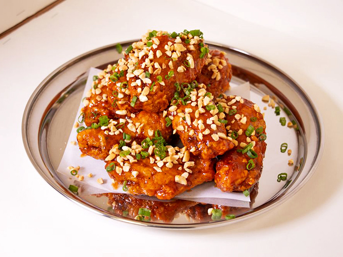 Holy crunch-fest, Batman! These Signature Yangnyum wings are so gloriously crispy, they could wake the neighbors.