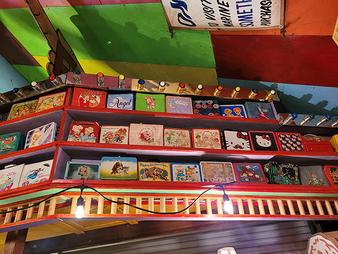 A rainbow of retro! These vintage lunchboxes aren't just containers; they're time capsules of bygone cartoons, teen idols, and Saturday morning memories.