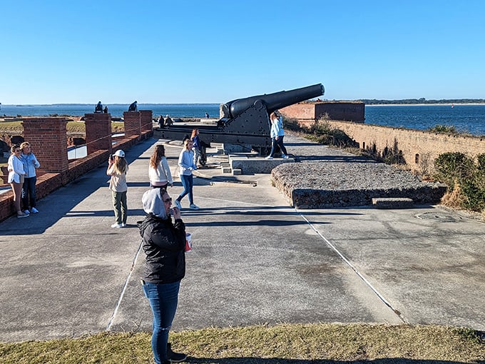 "Cannons and cameras at the ready! These visitors are capturing memories and imagining battles of yesteryear."