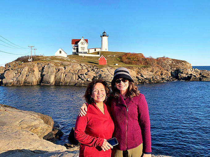 Two lighthouse enthusiasts living their best life. I'd say they've found their "light" at the end of the tunnel!