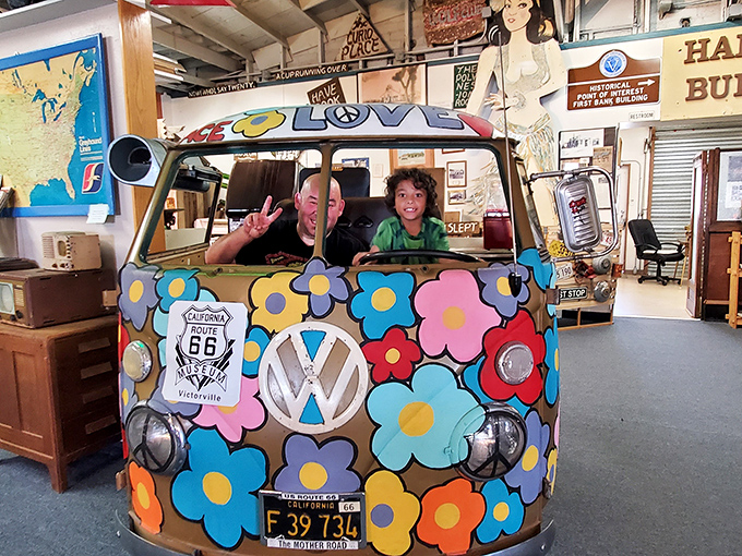 All aboard the flower power express! These happy travelers are clearly enjoying their psychedelic trip down memory lane.