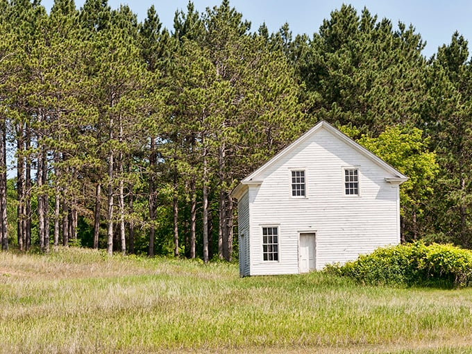This isn't your grandma's dollhouse - it's a time machine disguised as a quaint white cottage. No flux capacitor required!