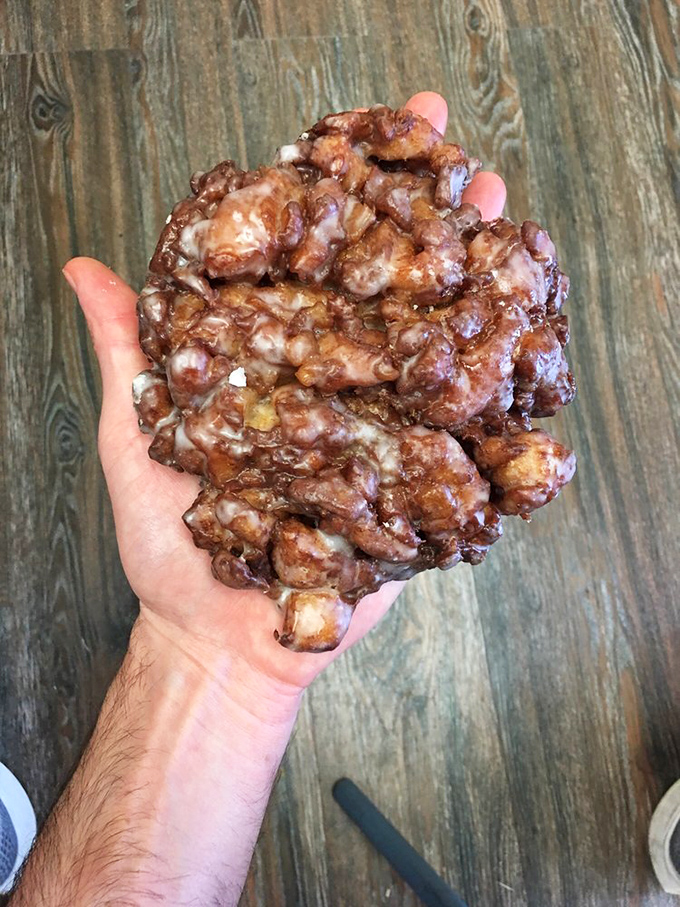 Holy fritter, Batman! This apple fritter is less a pastry and more a delicious, cinnamon-spiced meteor that's crash-landed on Earth to delight our taste buds.