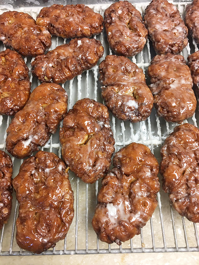 Apple fritters: nature's way of saying "treat yourself!" These craggy, cinnamon-laced wonders are autumn's answer to comfort food.