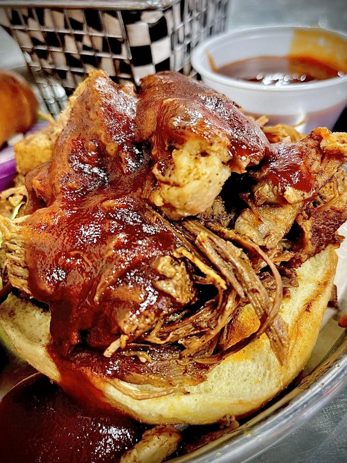 Brisket so tender, it practically melts on the plate. This sandwich is like a BBQ hug for your taste buds &ndash; messy, comforting, and absolutely worth the napkin investment.