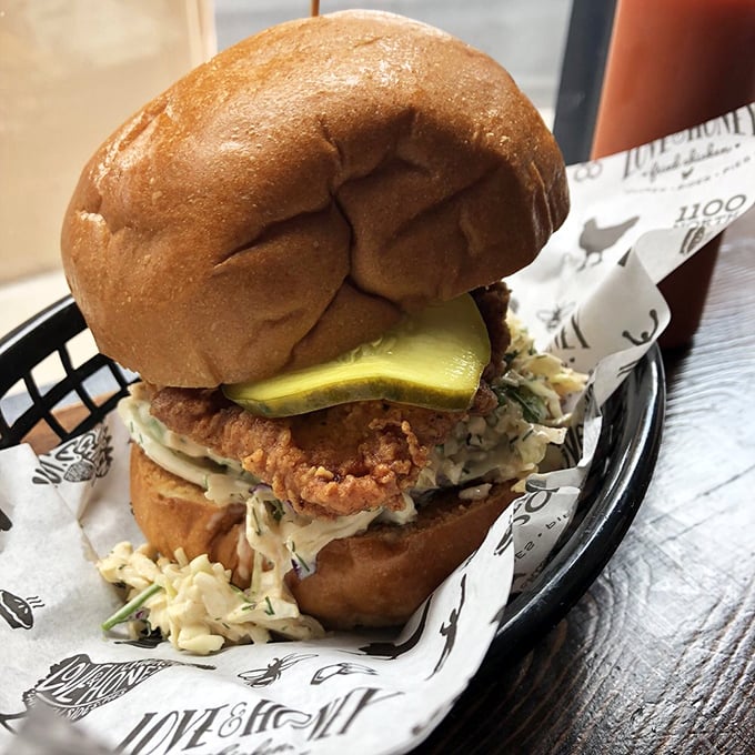 Hold onto your napkins, folks! This towering chicken sandwich is what happens when comfort food gets an MBA in deliciousness.