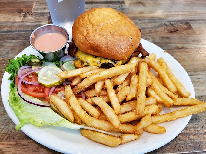 Hold onto your taste buds! This burger is stacked higher than my college textbooks and twice as satisfying. Napkins are not optional.