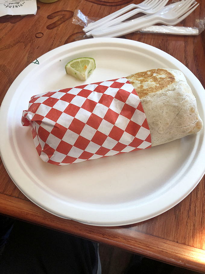 Wrapped up tighter than a superhero's spandex, this burrito is a flavor-packed powerhouse that'll have you saying "Holy guacamole!"