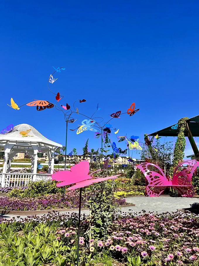 Whimsical butterfly sculptures dance above a garden gazebo, proving that art and nature make the perfect duet. It's a scene straight out of a fairy tale.