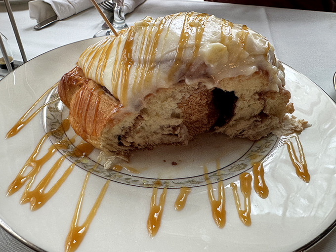 Cinnamon roll or work of art? This gooey masterpiece, drizzled with icing, is proof that sometimes the best things in life are gloriously messy.