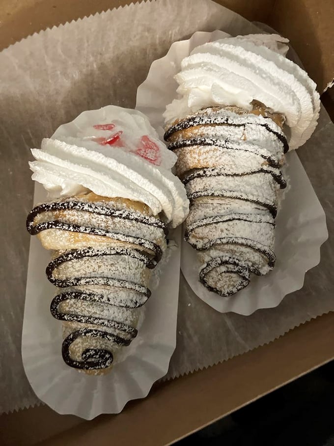 Cream horns that'll make you toot with delight! These spiral-shaped treats are like edible party horns for your taste buds.