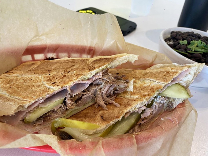 Ladies and gentlemen, the star of the show! This Cuban sandwich is ready for its close-up, and trust me, it's definitely ready for your taste buds.