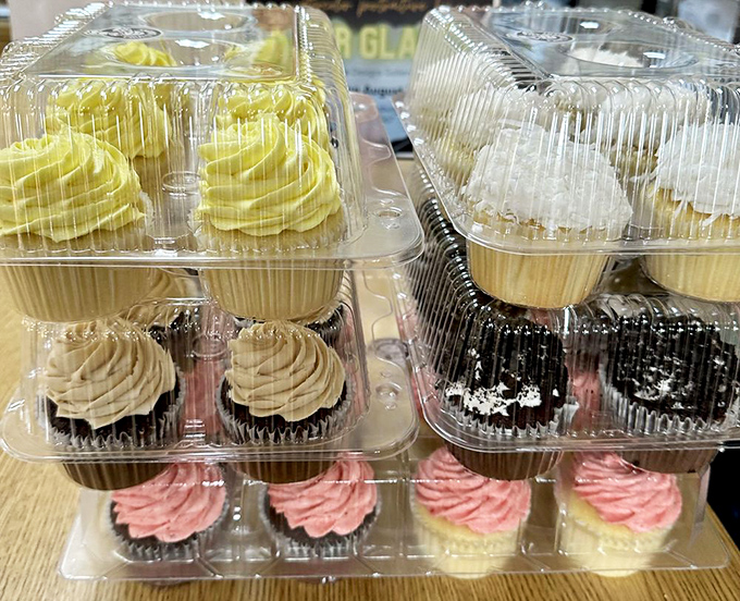 Cupcake heaven in plastic containers! These frosted beauties are dressed up and ready for their sweet sixteen... in your mouth.