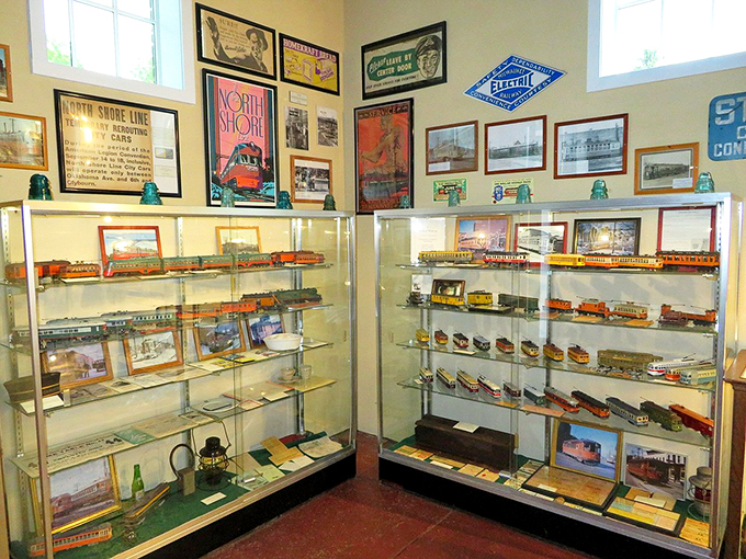 Miniature marvels galore! This display case is like a treasure chest for train enthusiasts&mdash;each tiny trolley tells a big story.