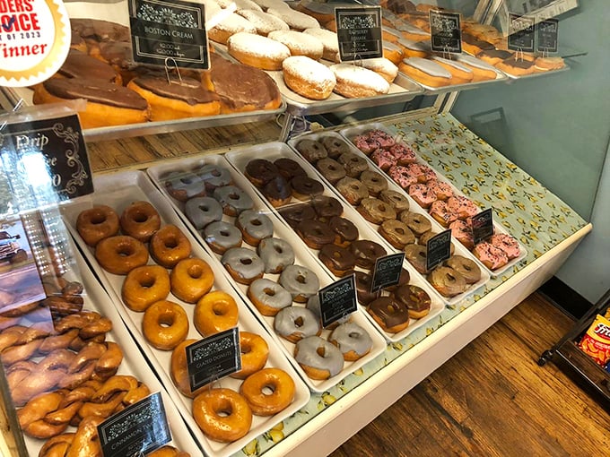 A rainbow of rings! This donut display is like a jewelry store for your taste buds. Go ahead, try on a few &ndash; calories don't count when you're window shopping.