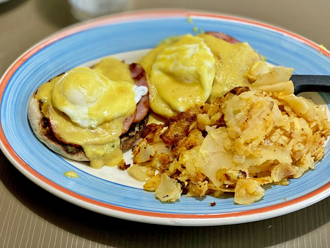 Eggs Benedict, the breakfast of champions! These golden orbs nestled on their throne are ready to rule your morning.