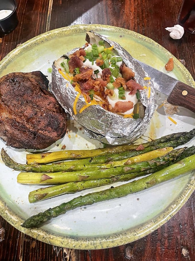 Steak so good, it'll make you forget your own name. This filet mignon is dressed to impress with a loaded spud and green beans.