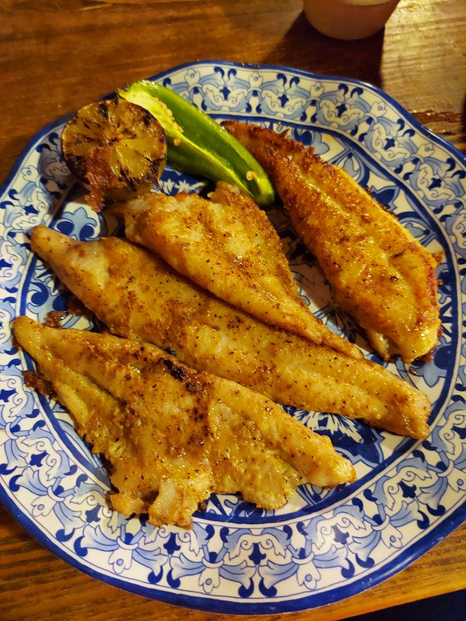 Grilled catfish that would make Huckleberry Finn weep with joy. Crispy, spicy, and served with a side of Southern hospitality.