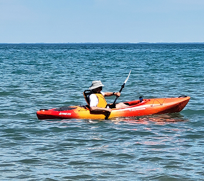 Paddle your way to serenity! This kayaker's living the dream &ndash; part explorer, part athlete, all relaxation. It's like yoga, but wetter and with better views.