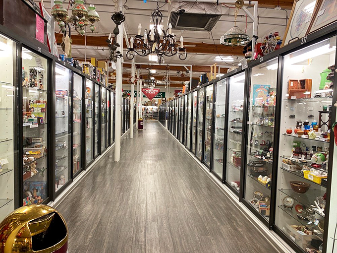 Tombstone Street: where treasures are locked up tighter than Fort Knox. These glass cases are like time capsules, each one a window to a different era.