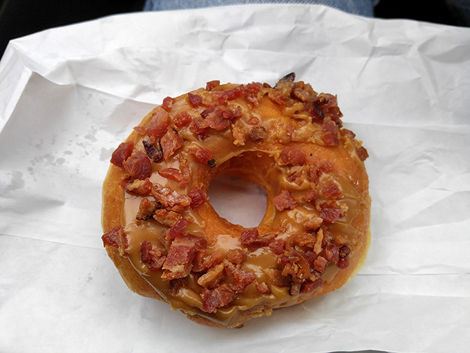 Breakfast of champions! This maple bacon donut is the superhero of morning treats, ready to save you from hunger pangs.