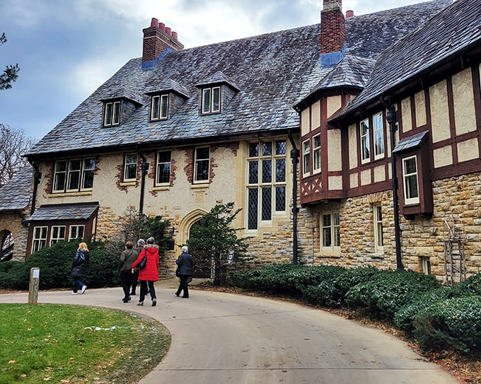 Welcome to Plummer House! These lucky visitors are about to embark on a journey through early 20th-century opulence.