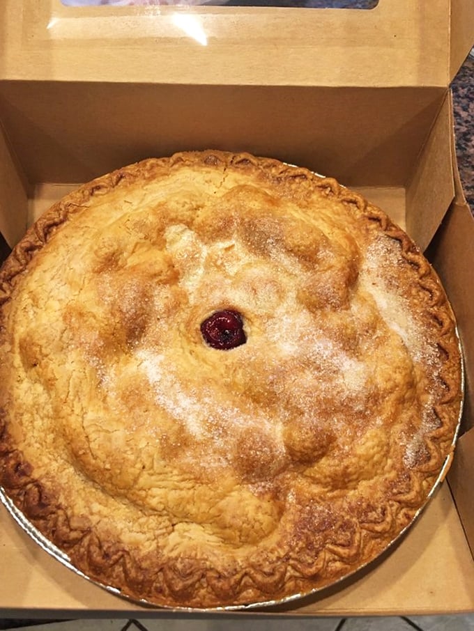 Behold, the golden-crusted crown jewel of Door County! This cherry pie isn't just dessert; it's a warm hug for your taste buds.